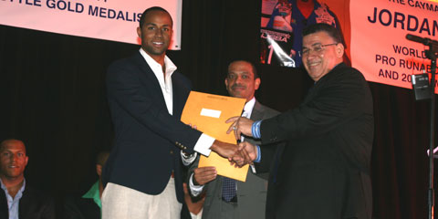 Premier honours our sports heroes - Cayman Compass